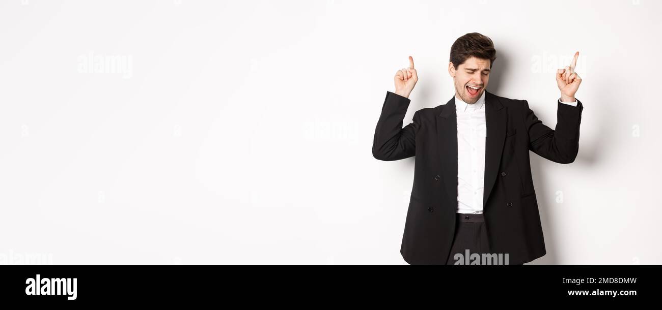 Image of successful handsome businessman dancing, enjoying party ...