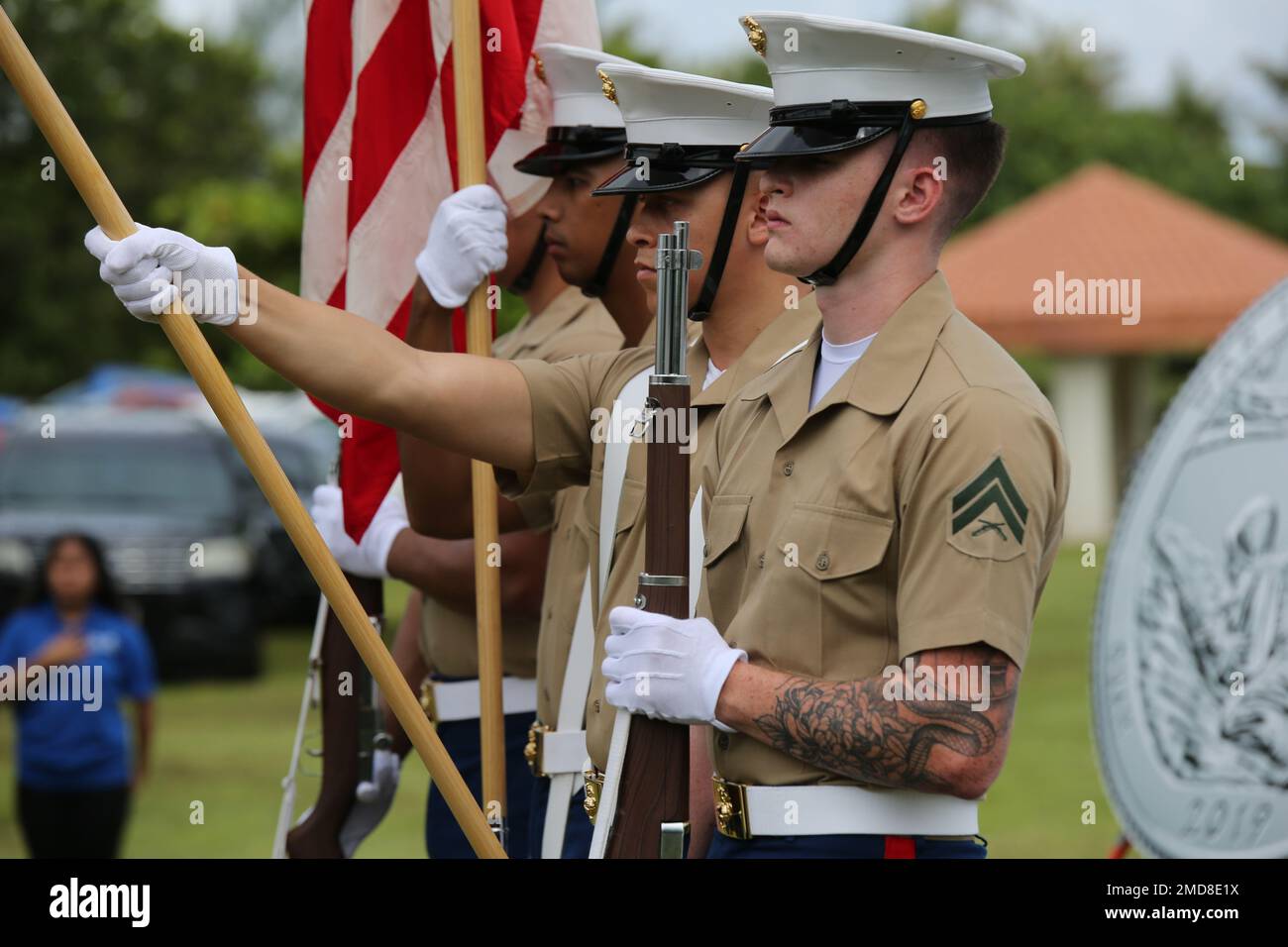 The Marine Corps Base Camp Blaz color guard presents the colors during ...