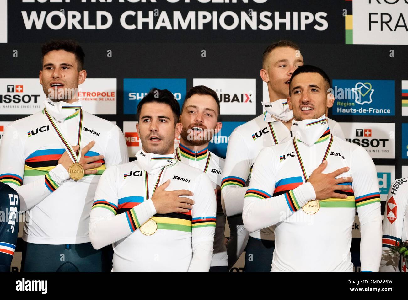 Riders of Team Italy celebrate their gold medals after winning the men ...