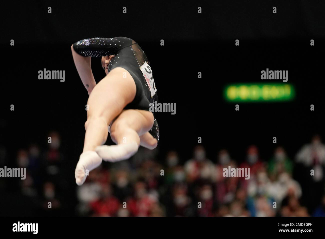 Rose Woo, of Canada, competes on the floor exercise during the FIG ...