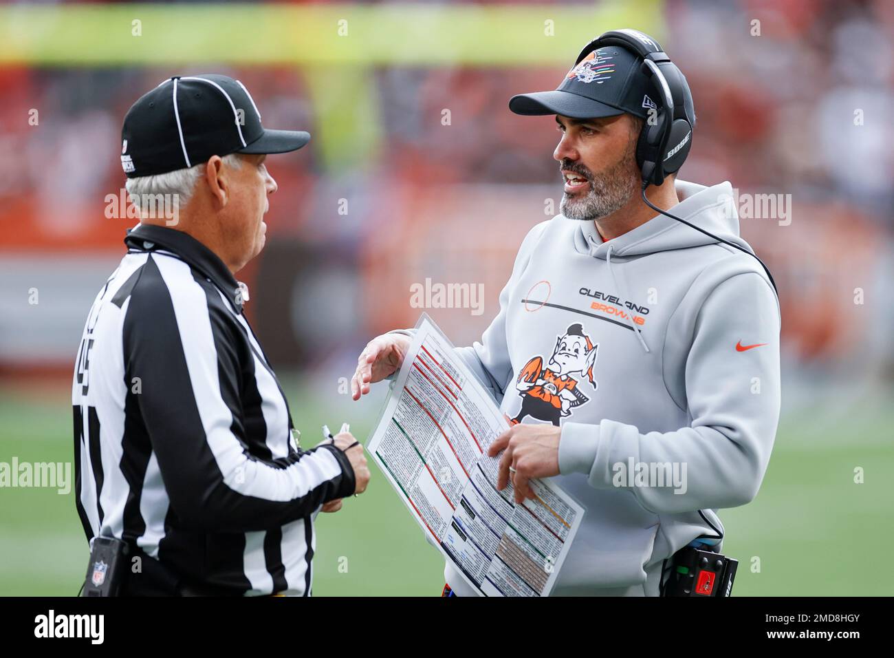 Cleveland Browns head coach Kevin Stefanski talks with line judge Jeff ...