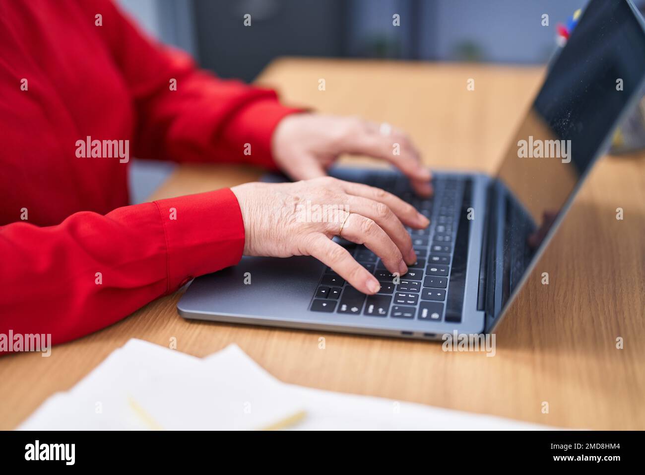 Senior woman business worker using laptop working at office Stock Photo ...