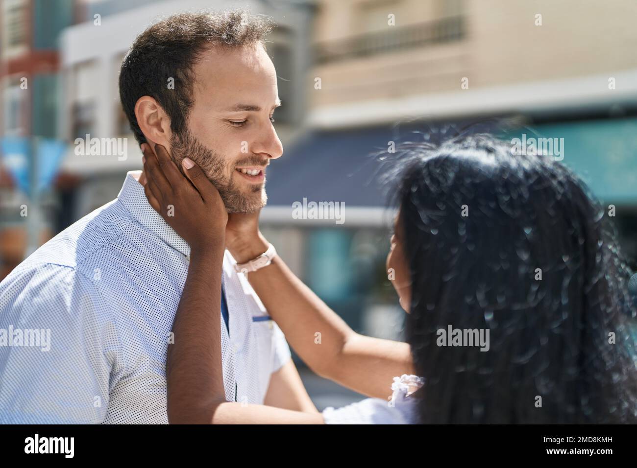Man And Woman Interracial Couple Hugging Each Other At Street Stock
