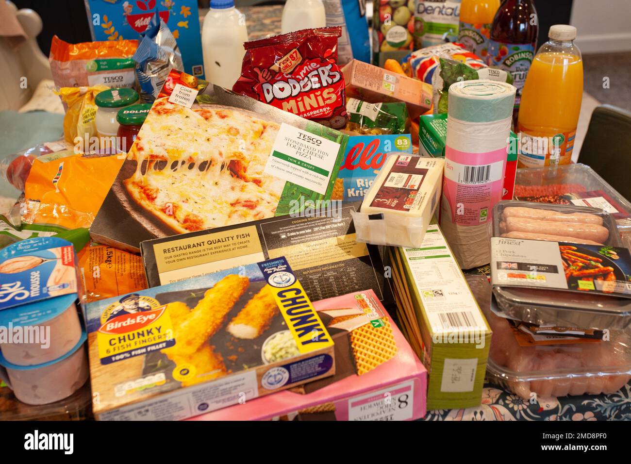 food shopping on table Stock Photo - Alamy