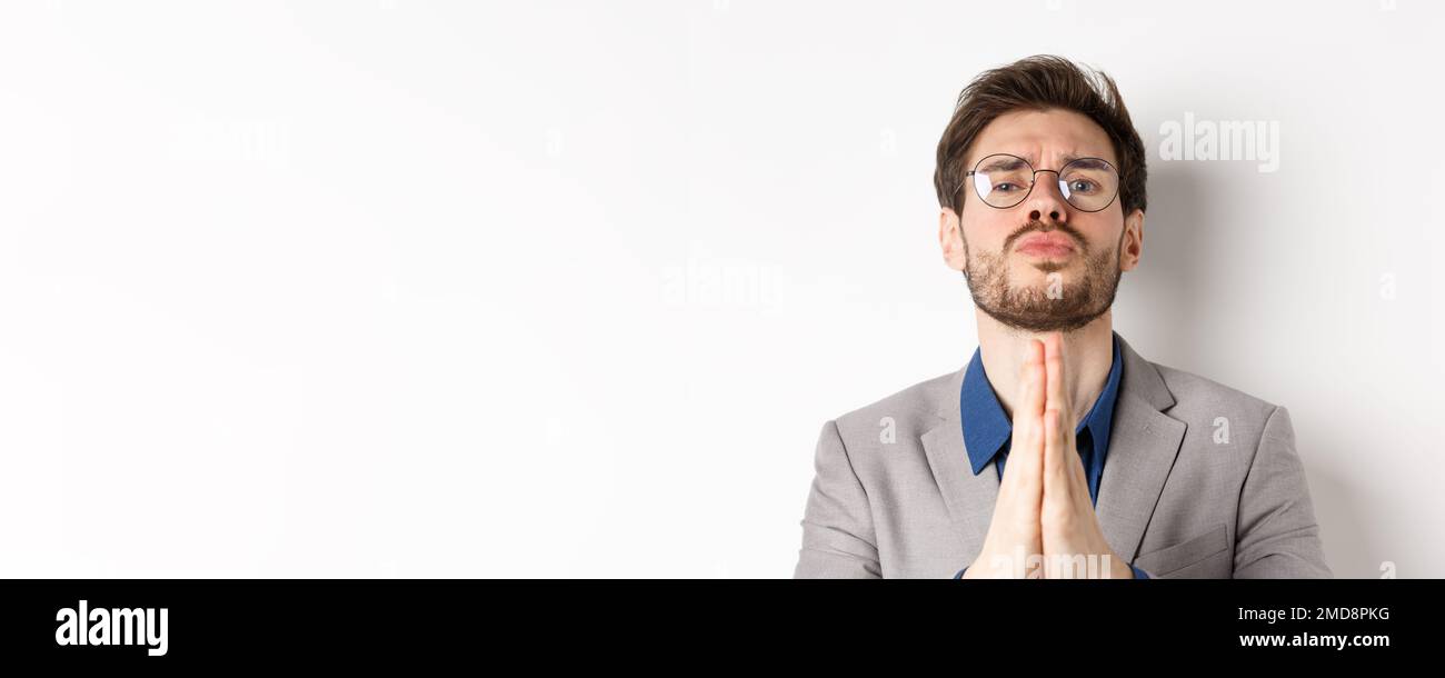 Clingy guy in glasses asking for last favour, begging for help and ...