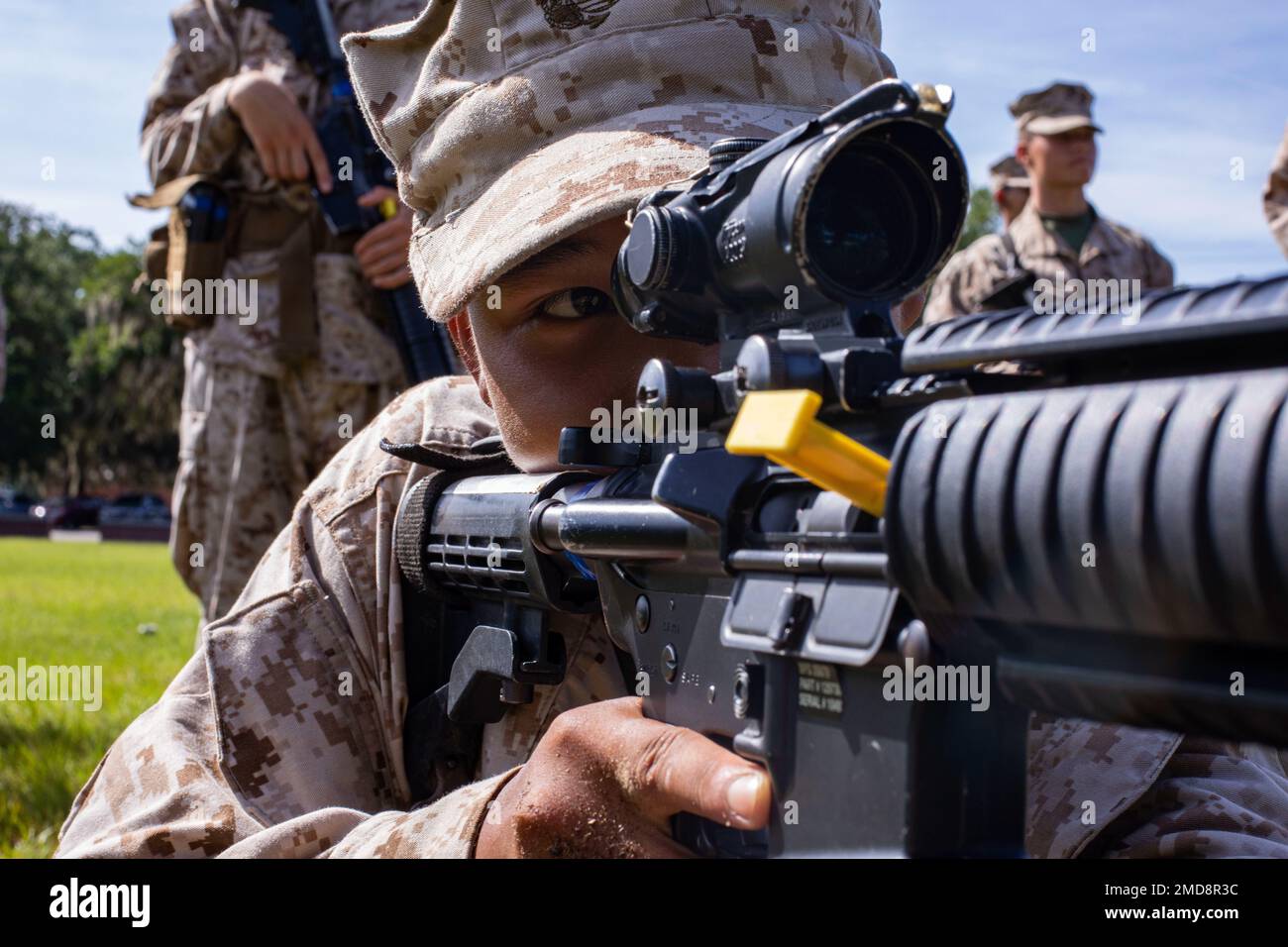 A recruit with Delta Company, 1st Recruit Training Battalion, sights ...
