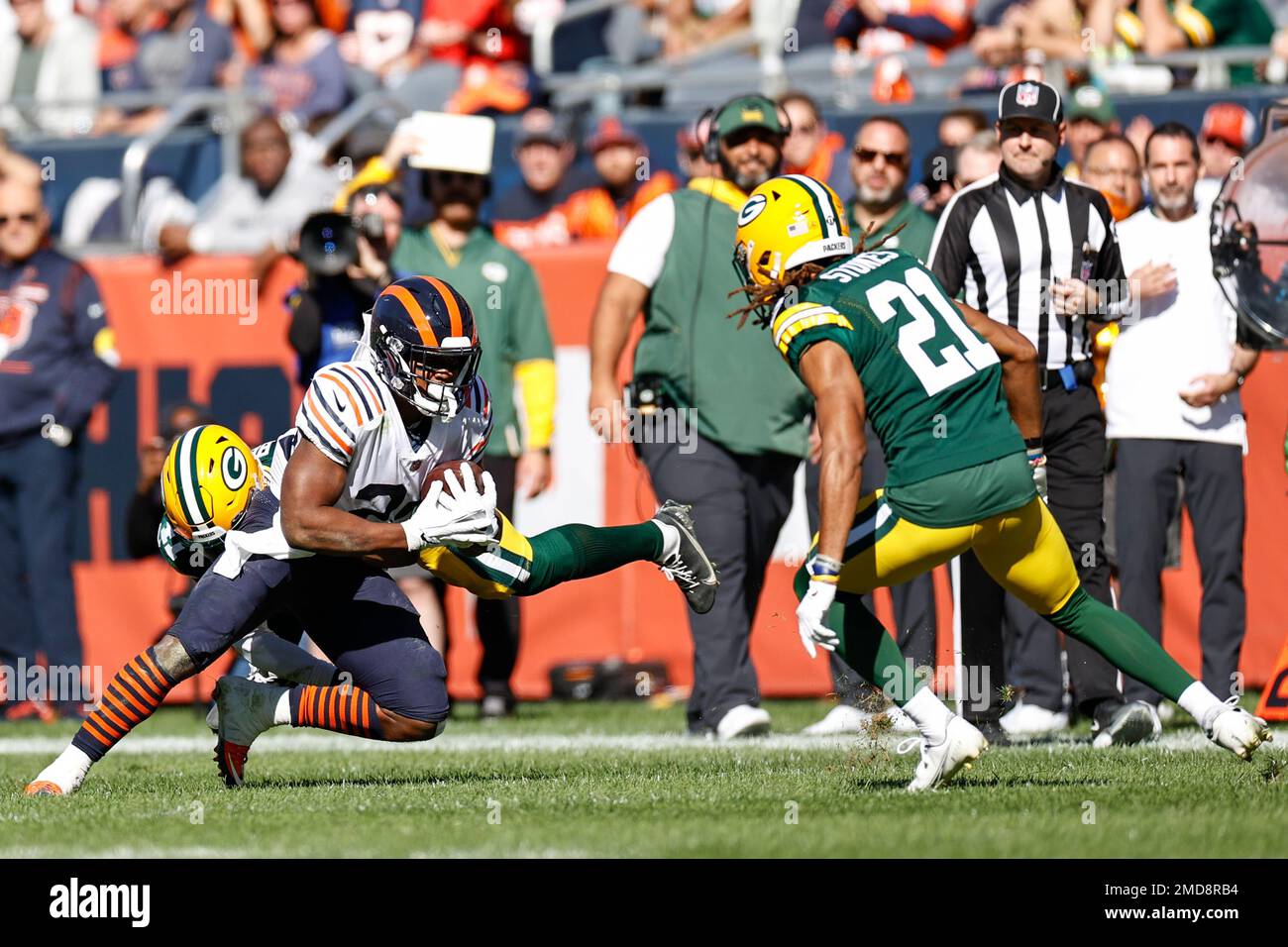 Chicago Bears running back Khalil Herbert (24) is tackled by Green Bay ...
