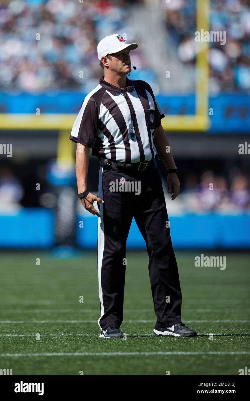 Referee Craig Wrolstad (4) at work during an NFL football game between ...
