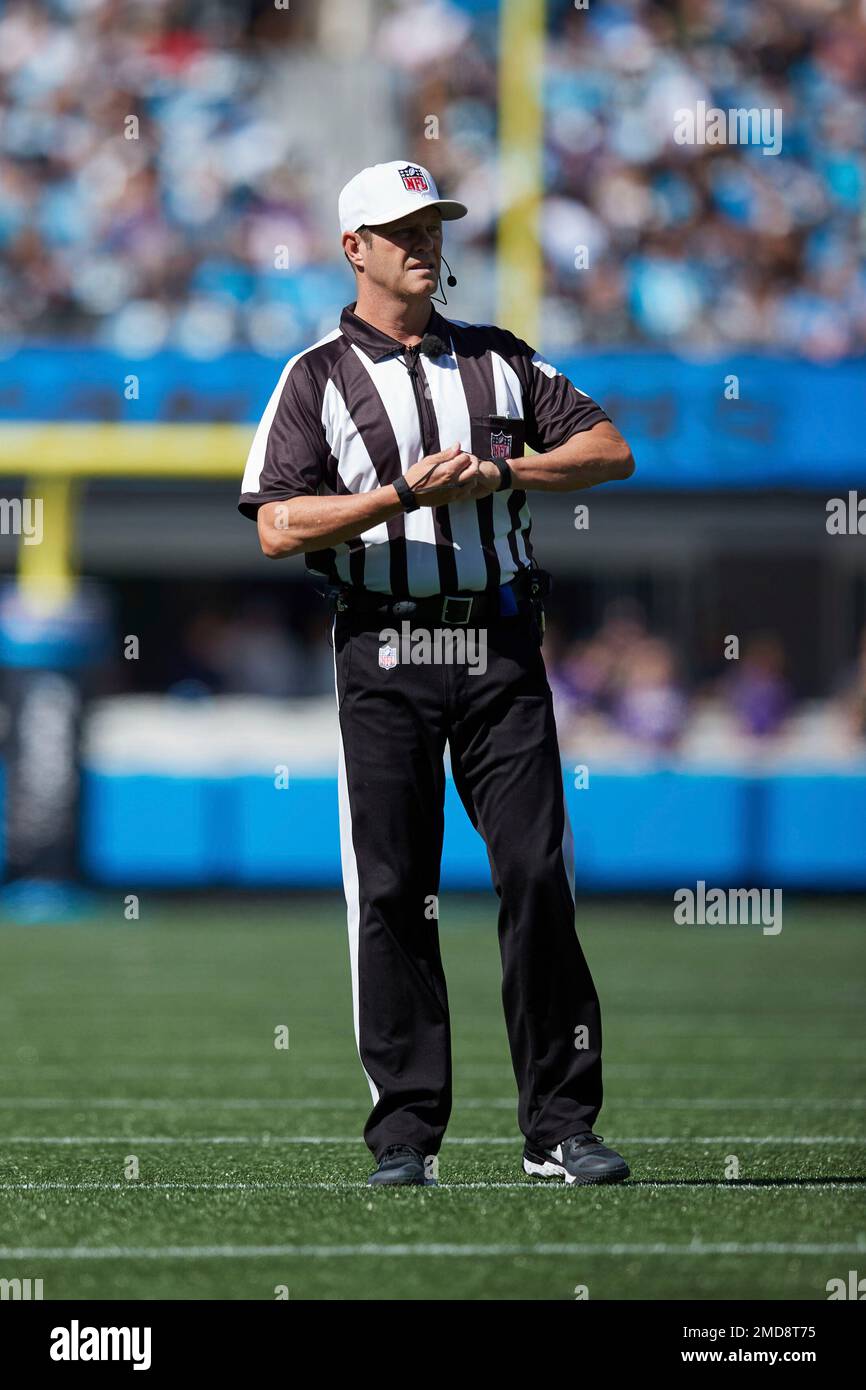 Referee Craig Wrolstad (4) at work during an NFL football game between ...