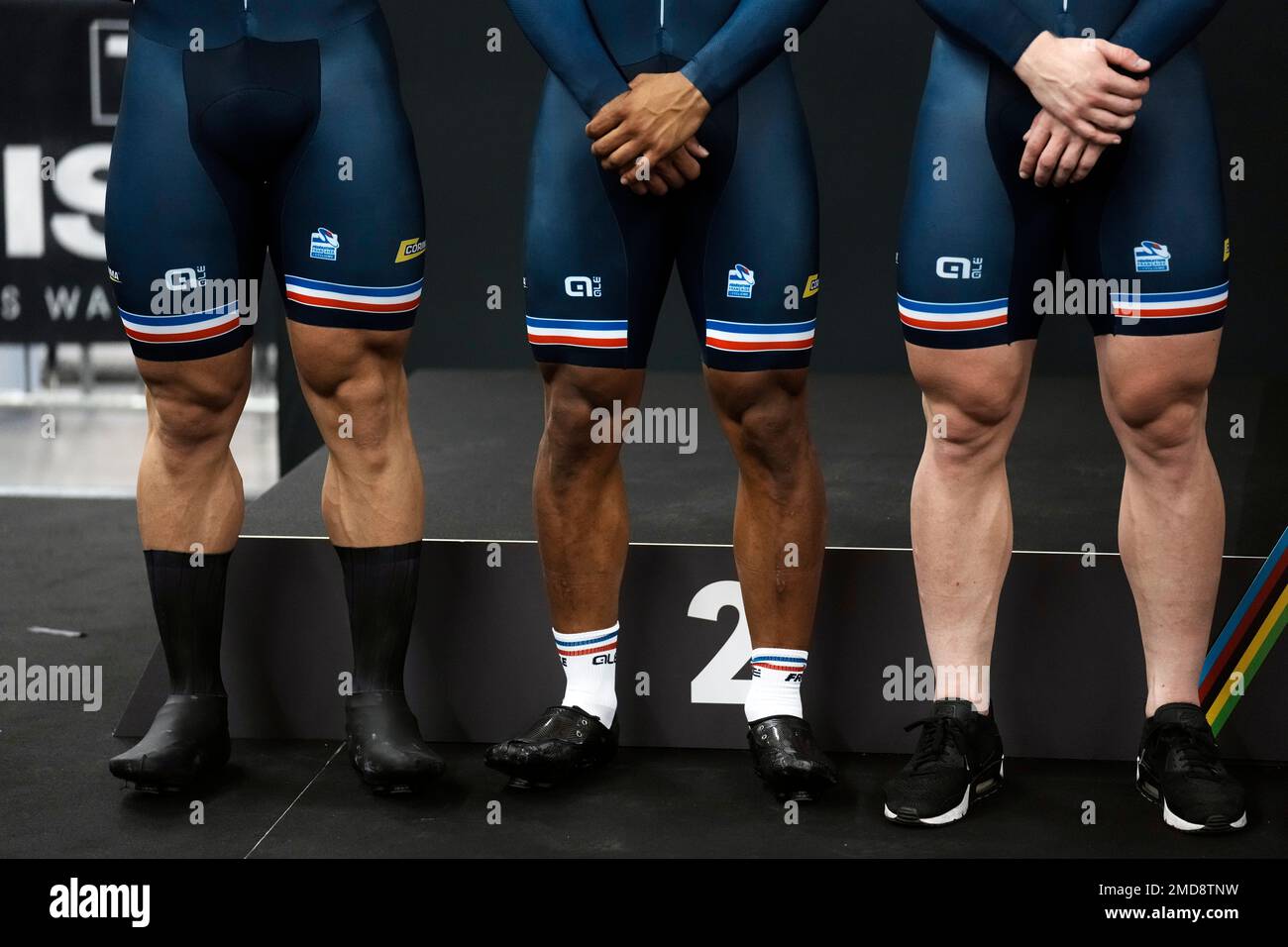 The legs of French silver medalist are pictured on the podium of the ...