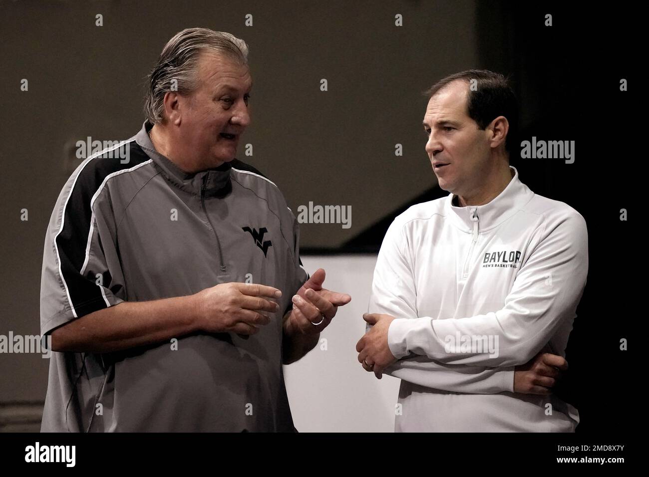 Baylor coach Scott Drew, right, and West Virginia coach Bob Huggins ...