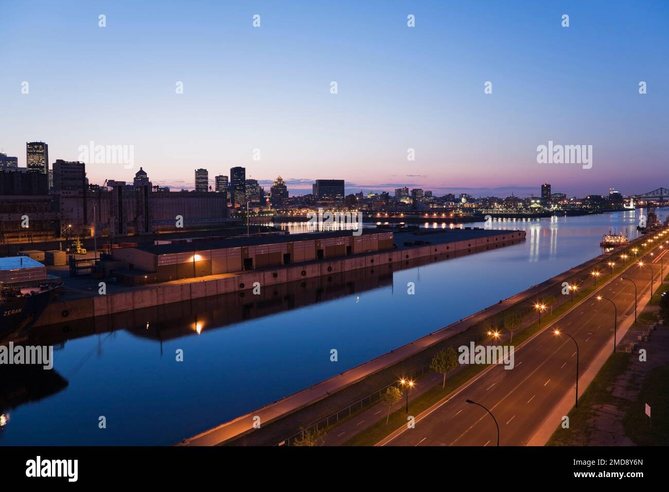 View of Pierre-Dupuy Avenue and Port of Montreal with city skyline at ...