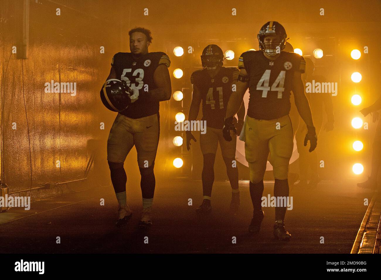 Members of the Pittsburgh Steelers prepare to take the field before an ...