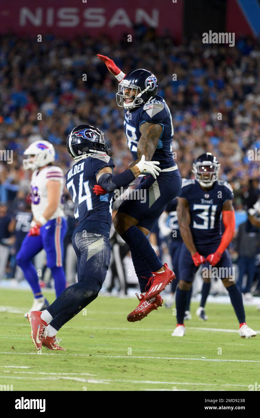 Tennessee Titans outside linebacker Harold Landry (58) and cornerback ...