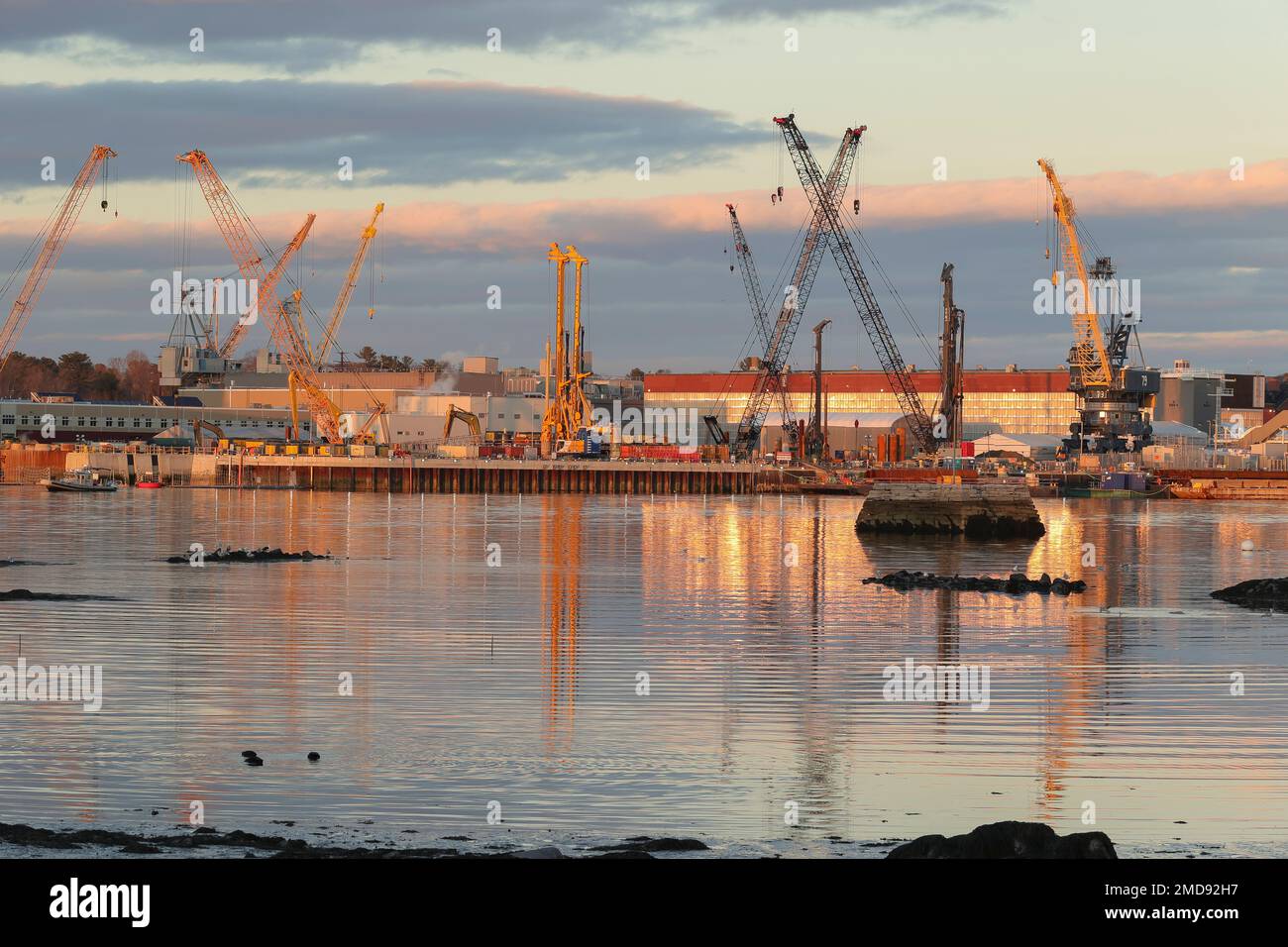 Plenty of cranes fill the sky at the Naval Shipyard in Kittery Point ...