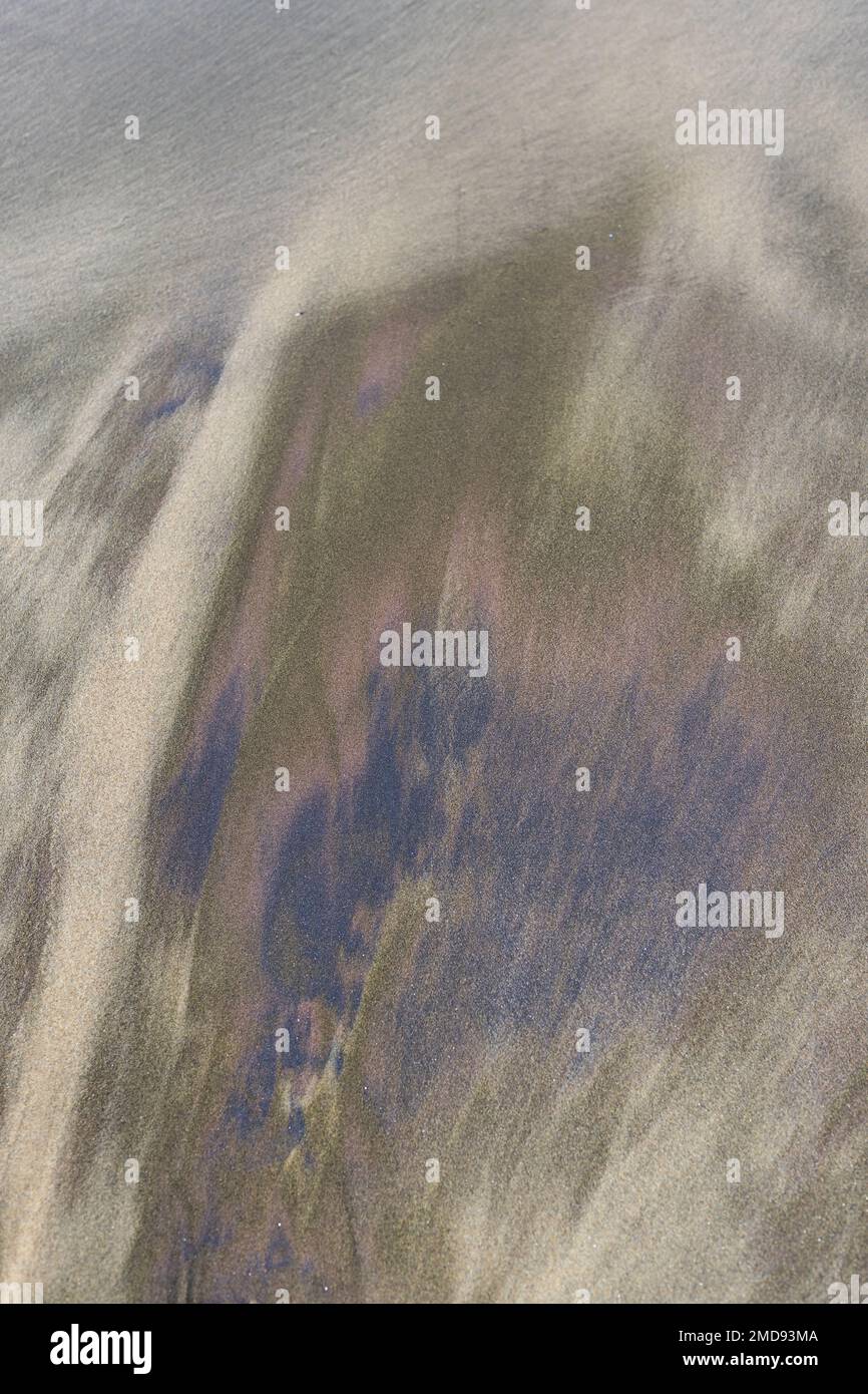 Patterns in sand after a winter storm and king tide, on the central ...