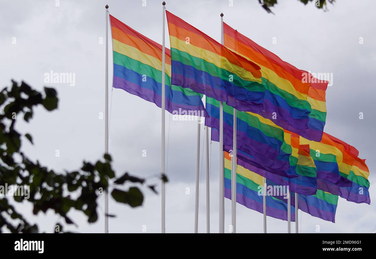 Rainbow flag against the sky hi-res stock photography and images - Alamy