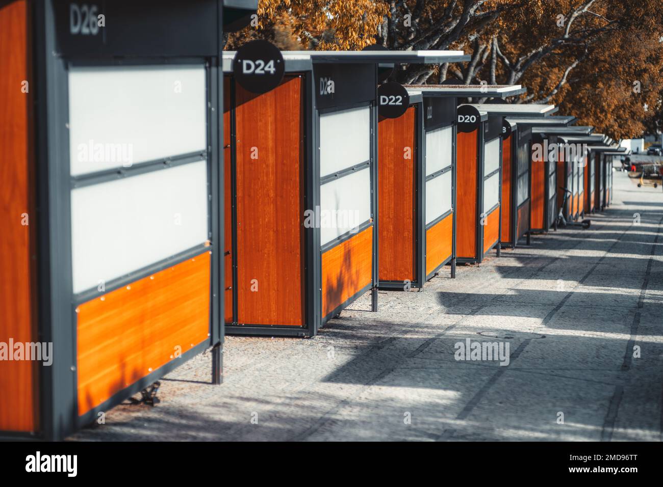 A capture of many closed cherry wood street food, bookstore, and ...