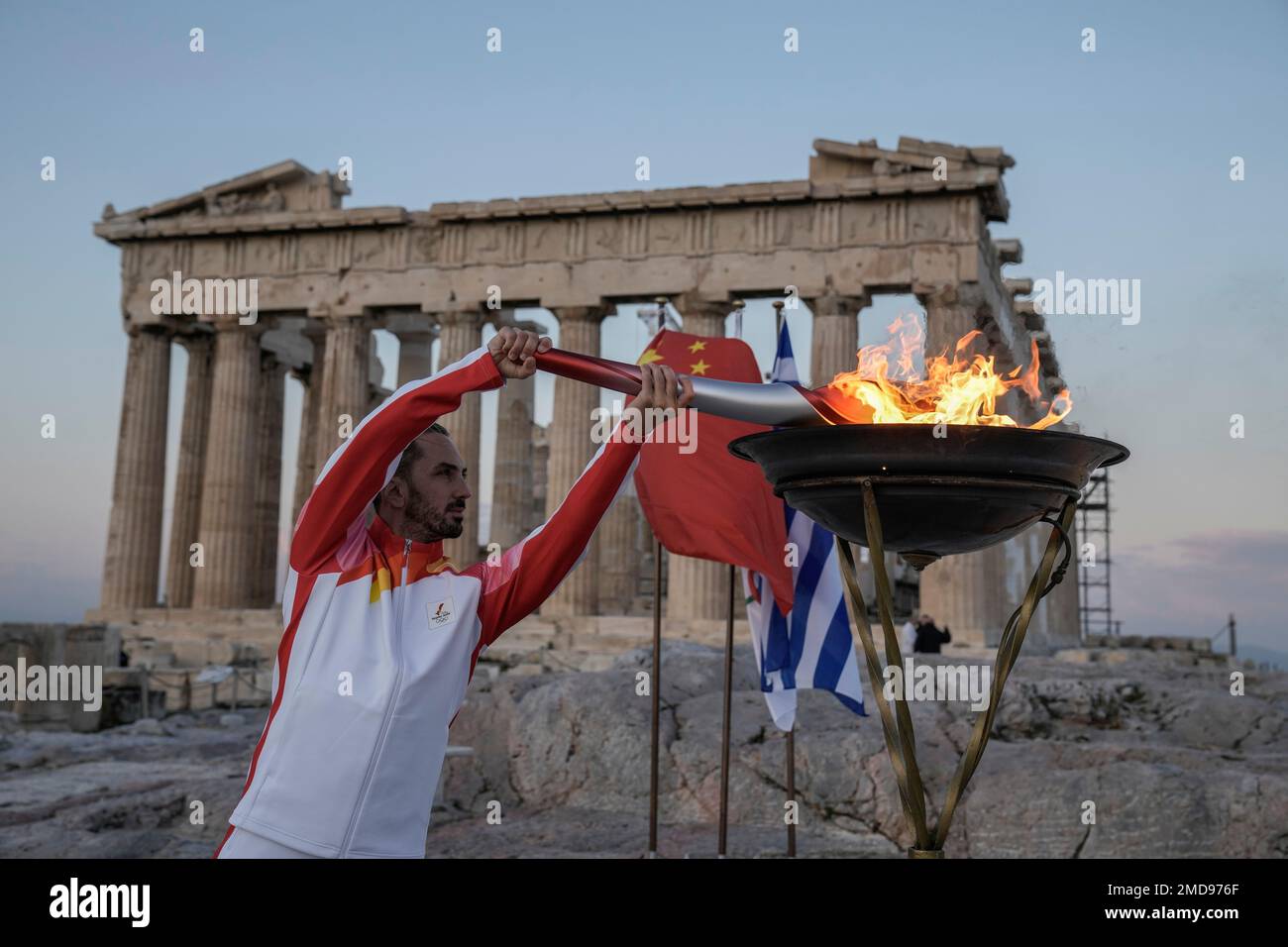 Greek Torch bearer Ioannis Melissanidis, Olympic gold medalist in ...