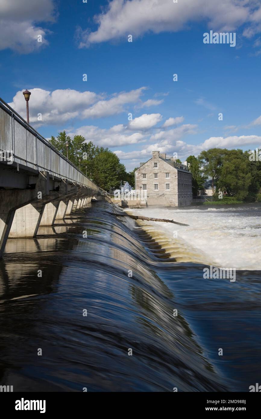 Footbridge and water flow control gate over Des Mille-Iles River and ...