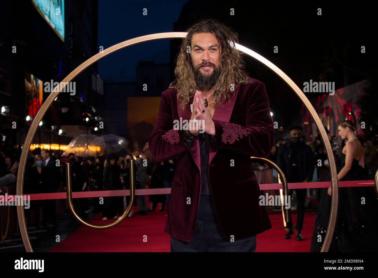 Jason Mamoa poses for photographers upon arrival at the premiere of the ...