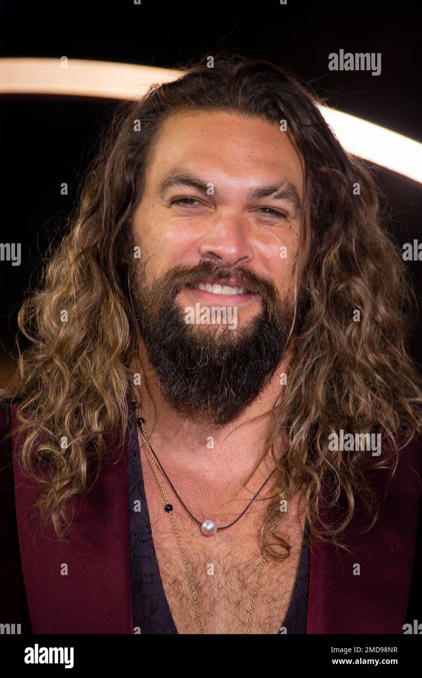 Jason Mamoa poses for photographers upon arrival at the premiere of the ...