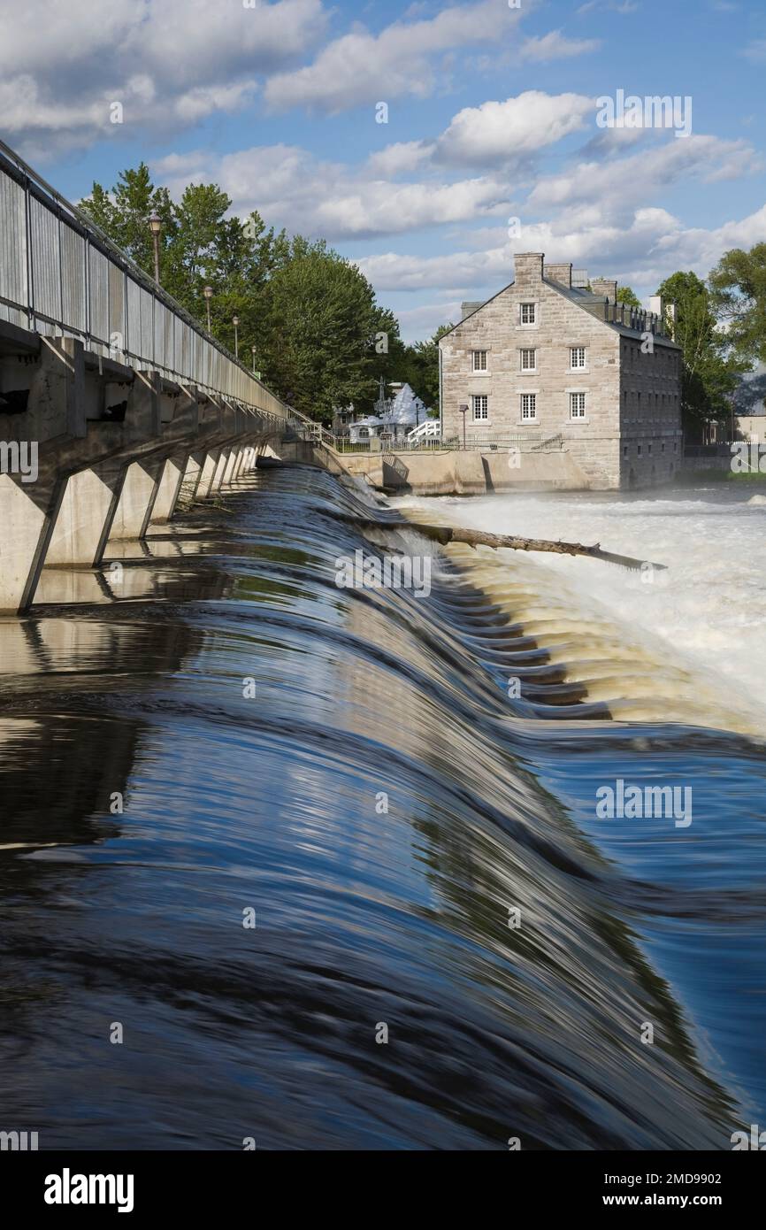 Footbridge and water flow control gate over Des Mille-Iles River and ...