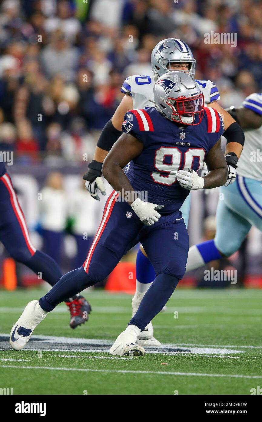 New England Patriots defensive tackle Christian Barmore (90) defends ...