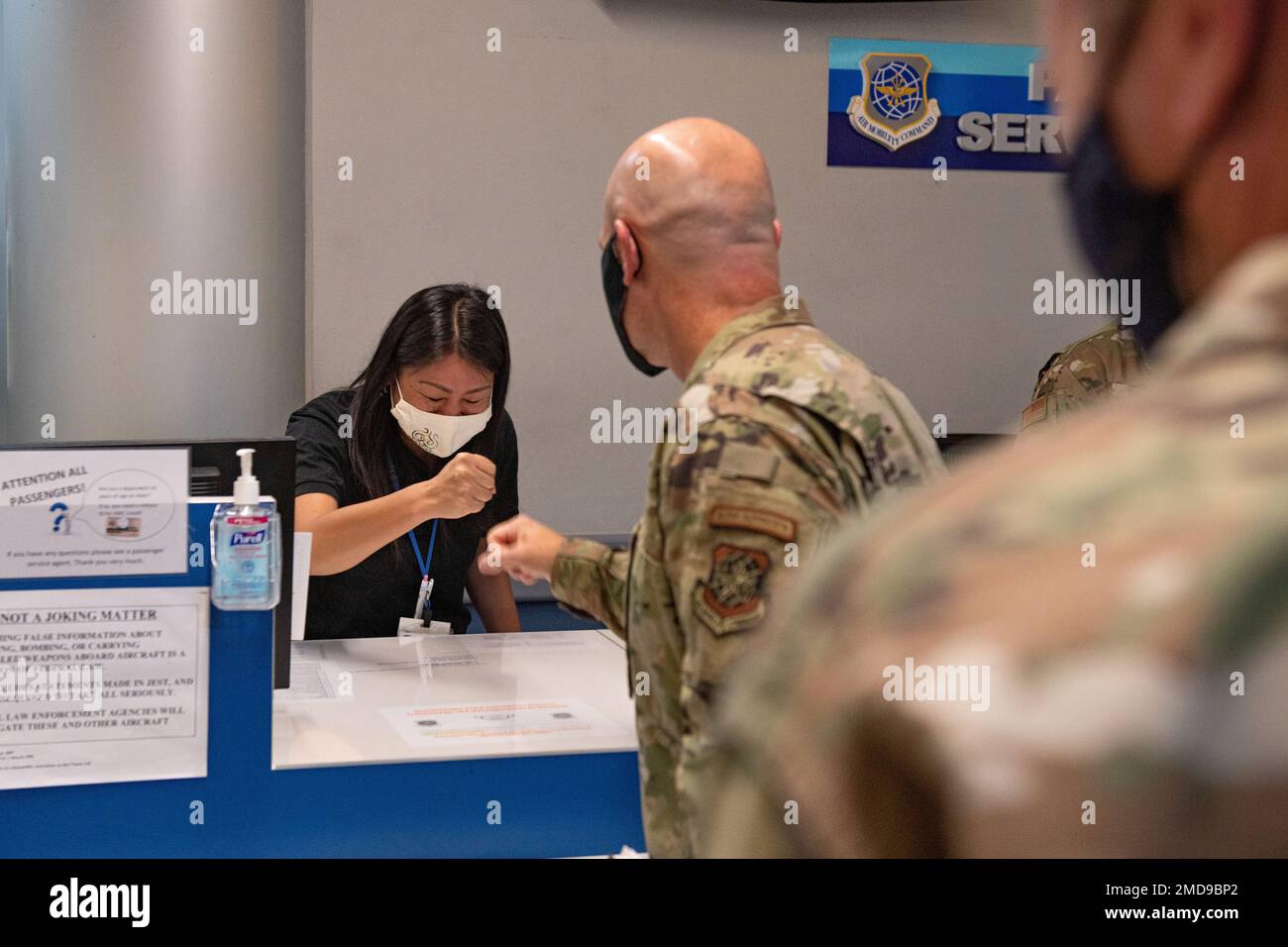 U.S. Air Force Col. Kyle Benwitz, center, 515th Air Mobility Operations ...