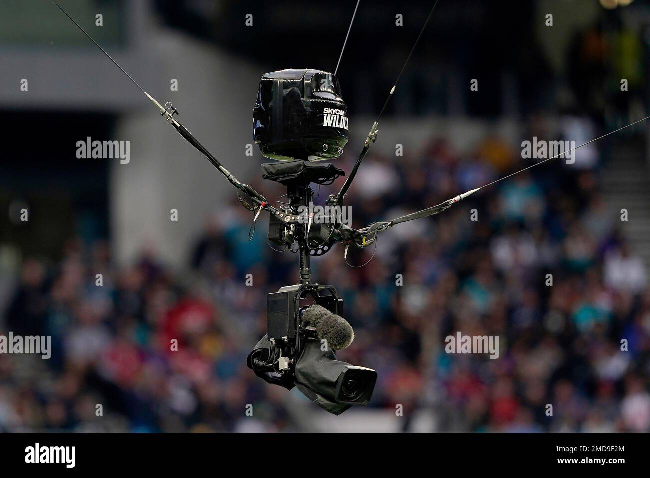 A close up, detail view of the skycam during an NFL football game ...