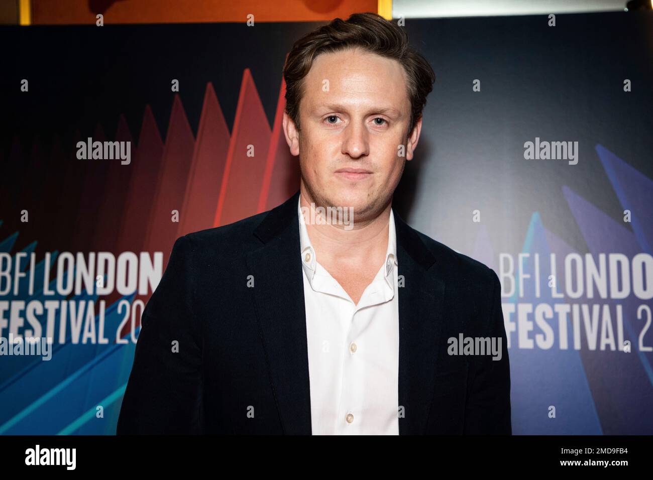Richard Goulding poses for photographers upon arrival at the premiere ...