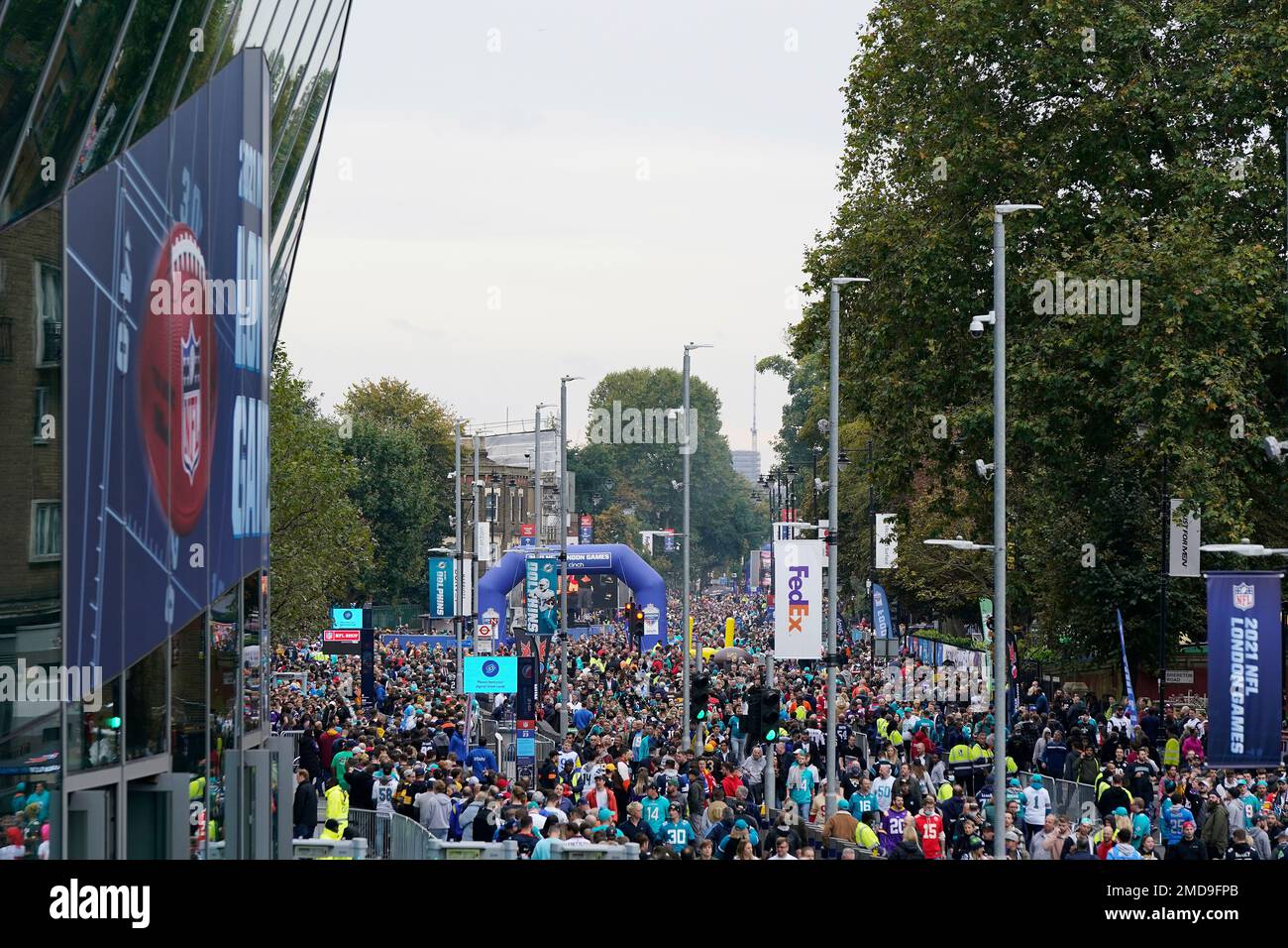 Fans fill the street outside Tottenham Hotspur Stadium before an NFL ...