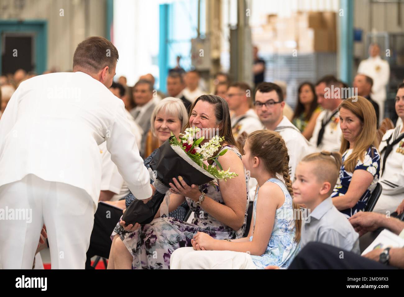 The family of Cmdr. Robert Patchin, commanding officer, Unmanned Undersea Vehicle Squadron ...