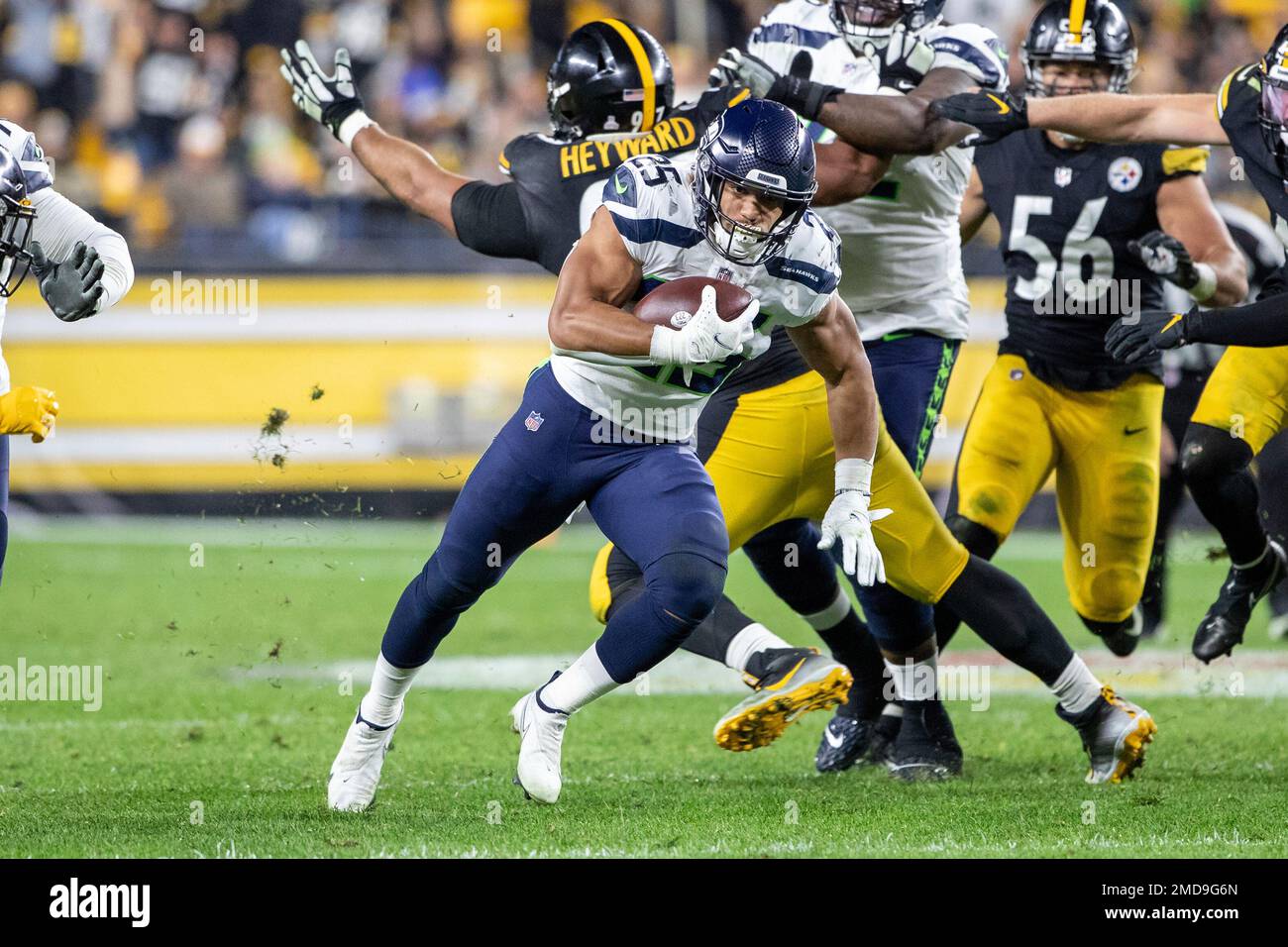 Seattle Seahawks running back Travis Homer (25) rushes during an NFL ...