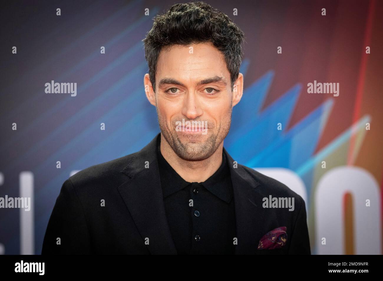 Alex Hassell poses for photographers upon arrival at the closing night ...