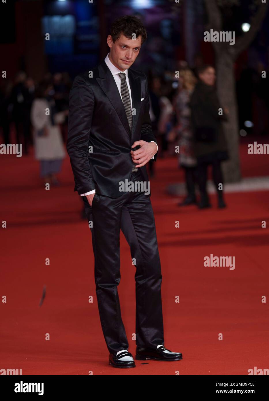 Actor Nicholas Rea poses on the red carpet for the movie 'Promises' at ...