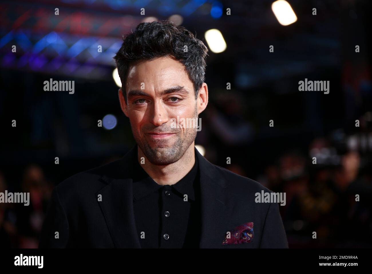 Alex Hassell poses for photographers upon arrival at the closing night ...
