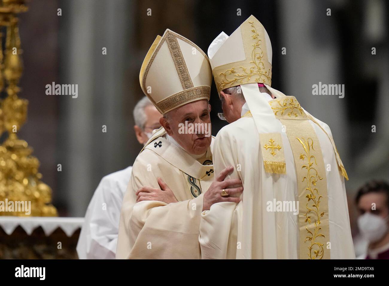 Pope Francis congratulates newly ordained bishop Guido Marini, right ...