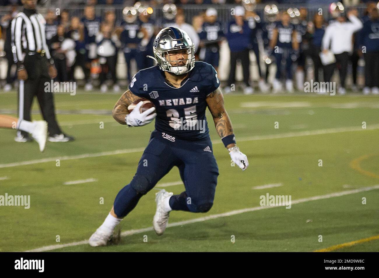 Nevada running back Toa Taua (35) runs against Hawaii in the second ...