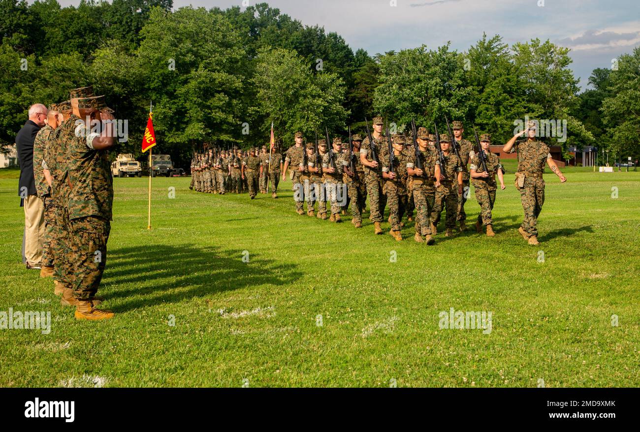 Reviewing officers salute parading Marines at The Basic School Change ...