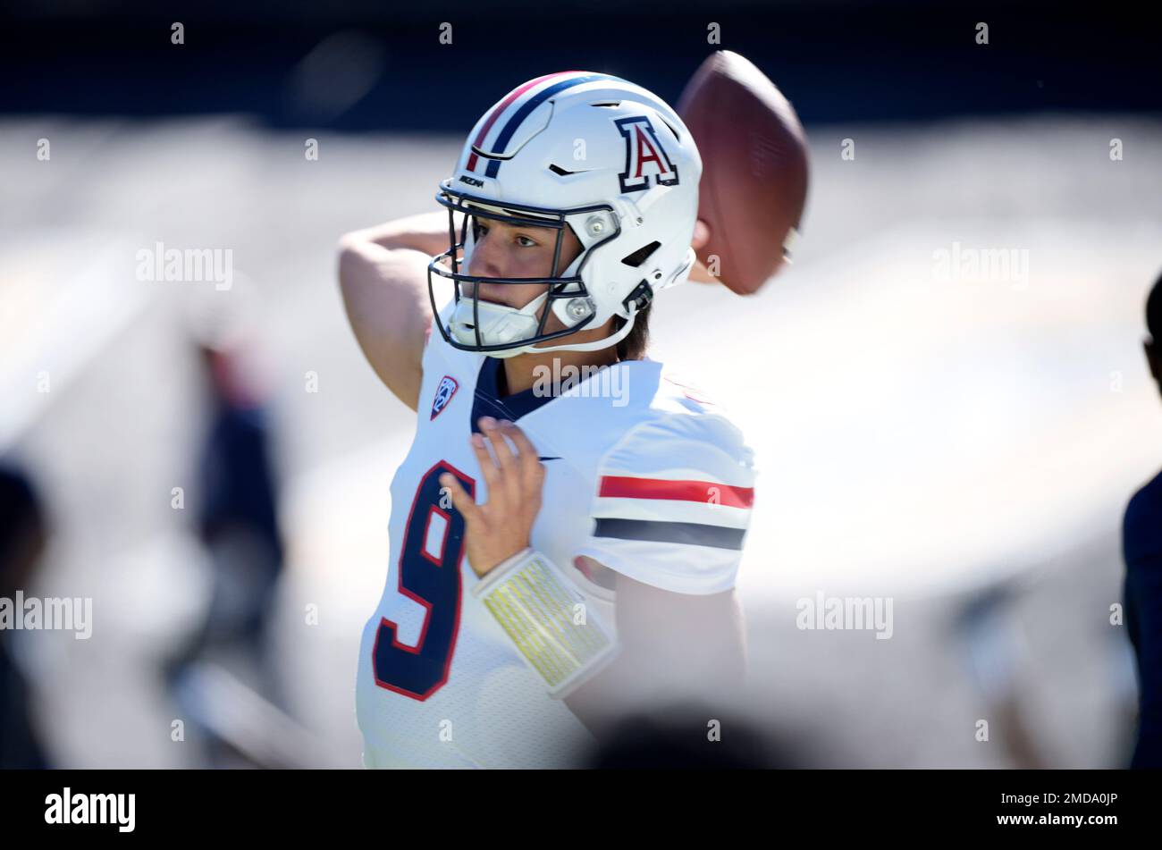Arizona quarterback Gunner Cruz warms up before an NCAA college ...
