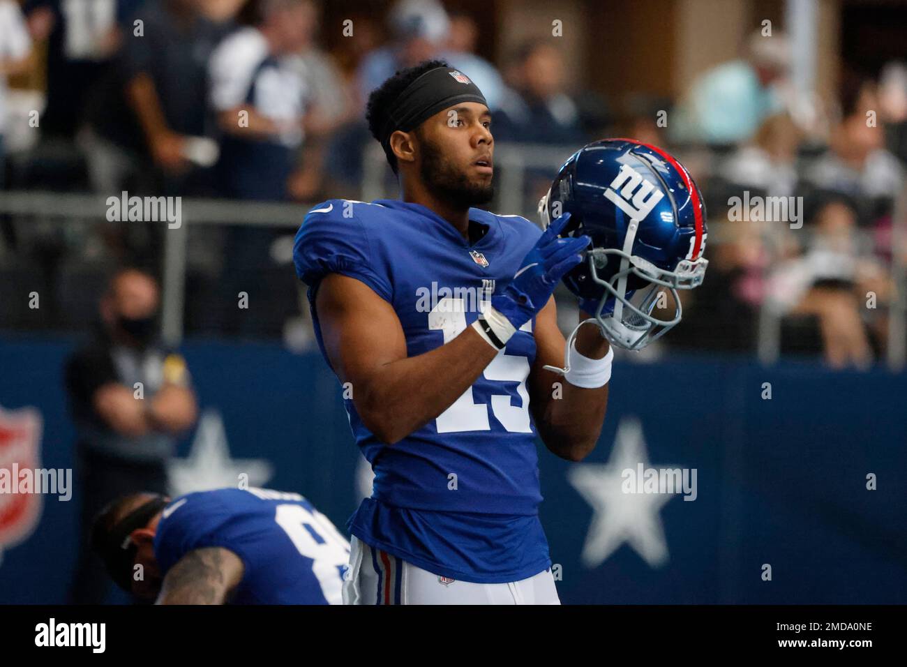 New York Giants wide receiver Collin Johnson (15) walks onto the field ...