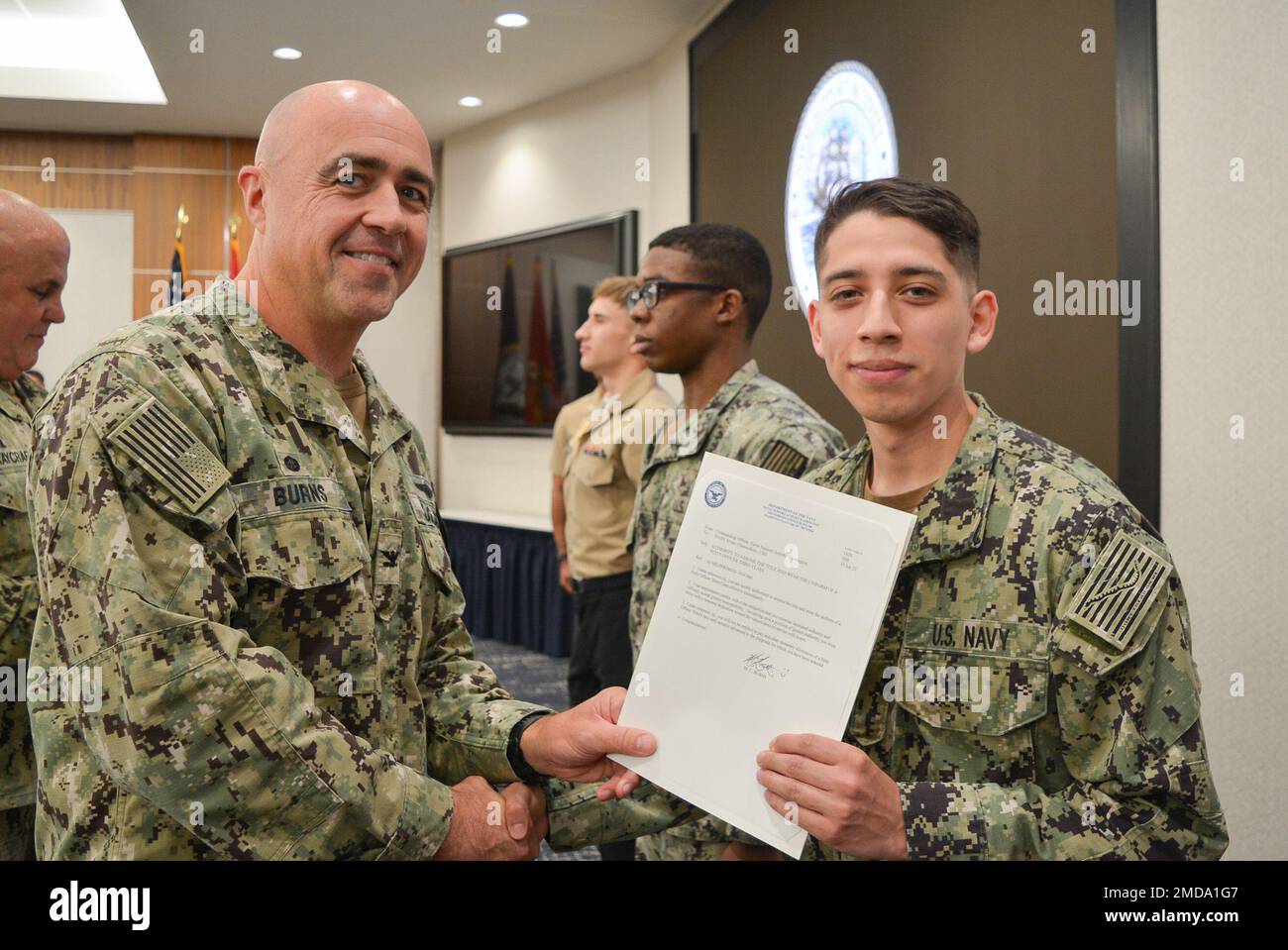 WASHINGTON, DC (July 14, 2022) - Capt. Mark Burns (left), Naval Support ...