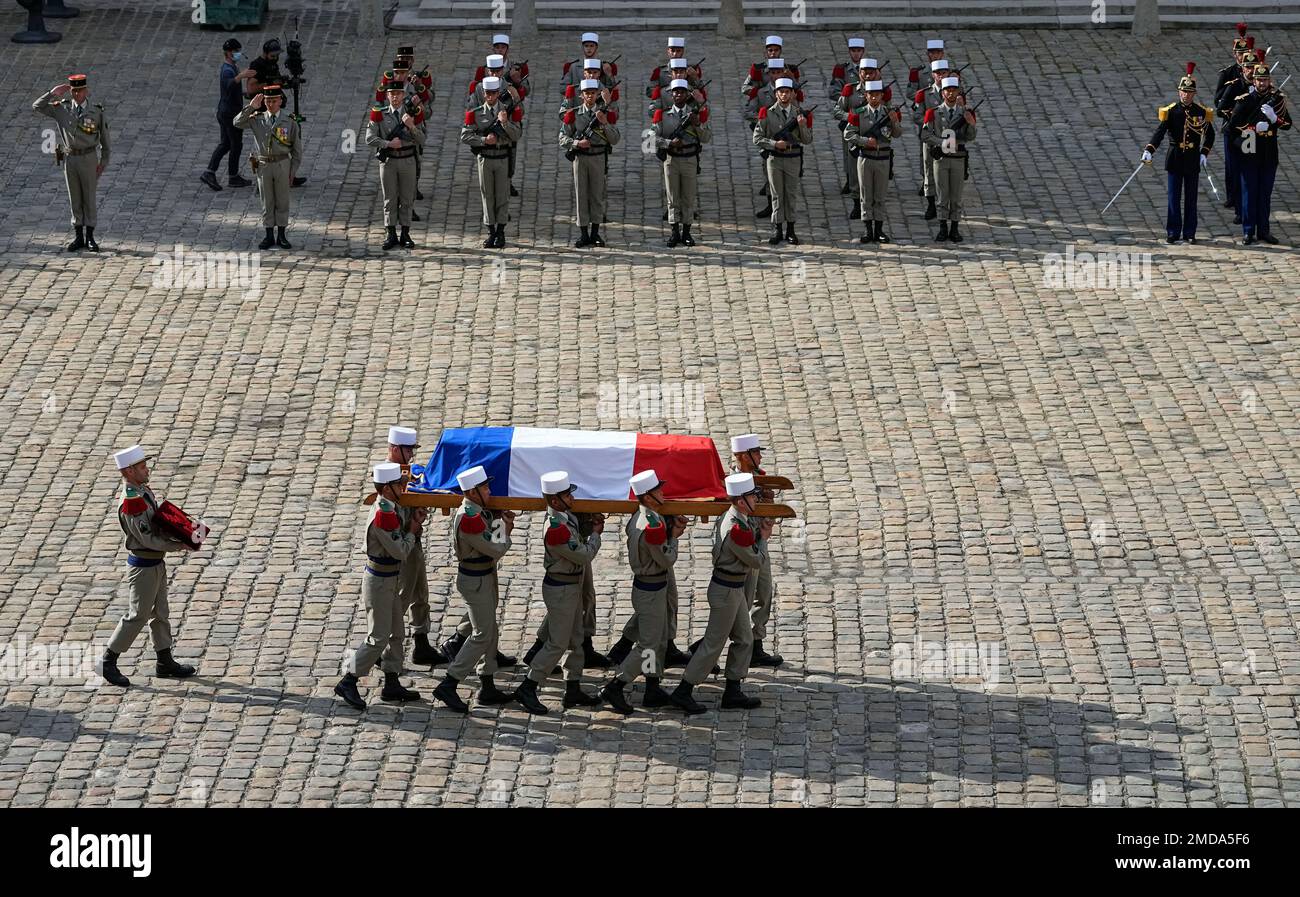Soldiers of the foreign legion carry the coffin of late Hubert Germain ...
