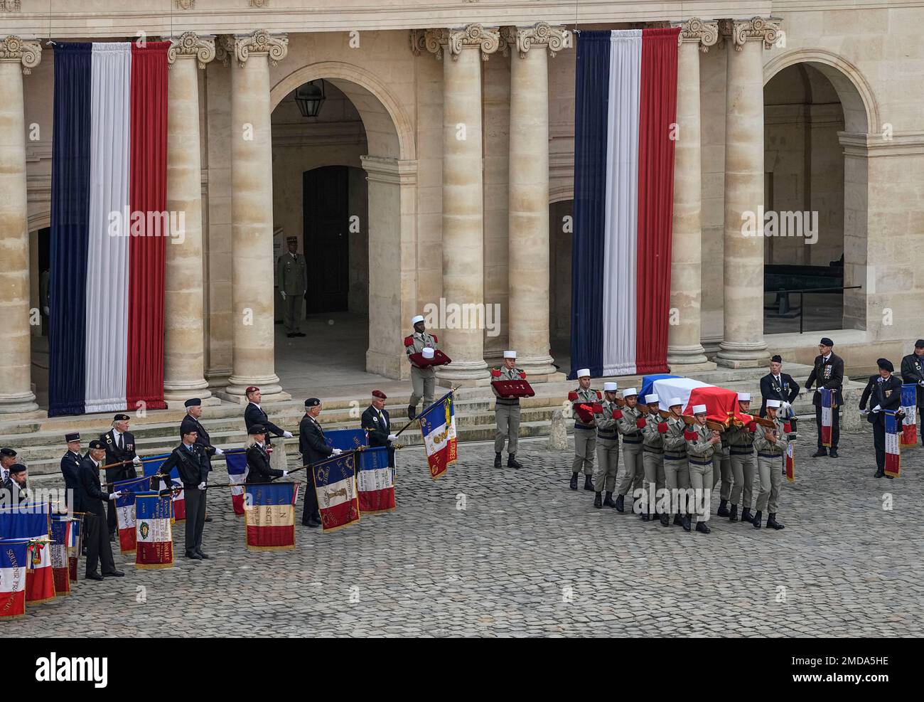 Soldiers of the foreign legion carry the coffin of late Hubert Germain ...