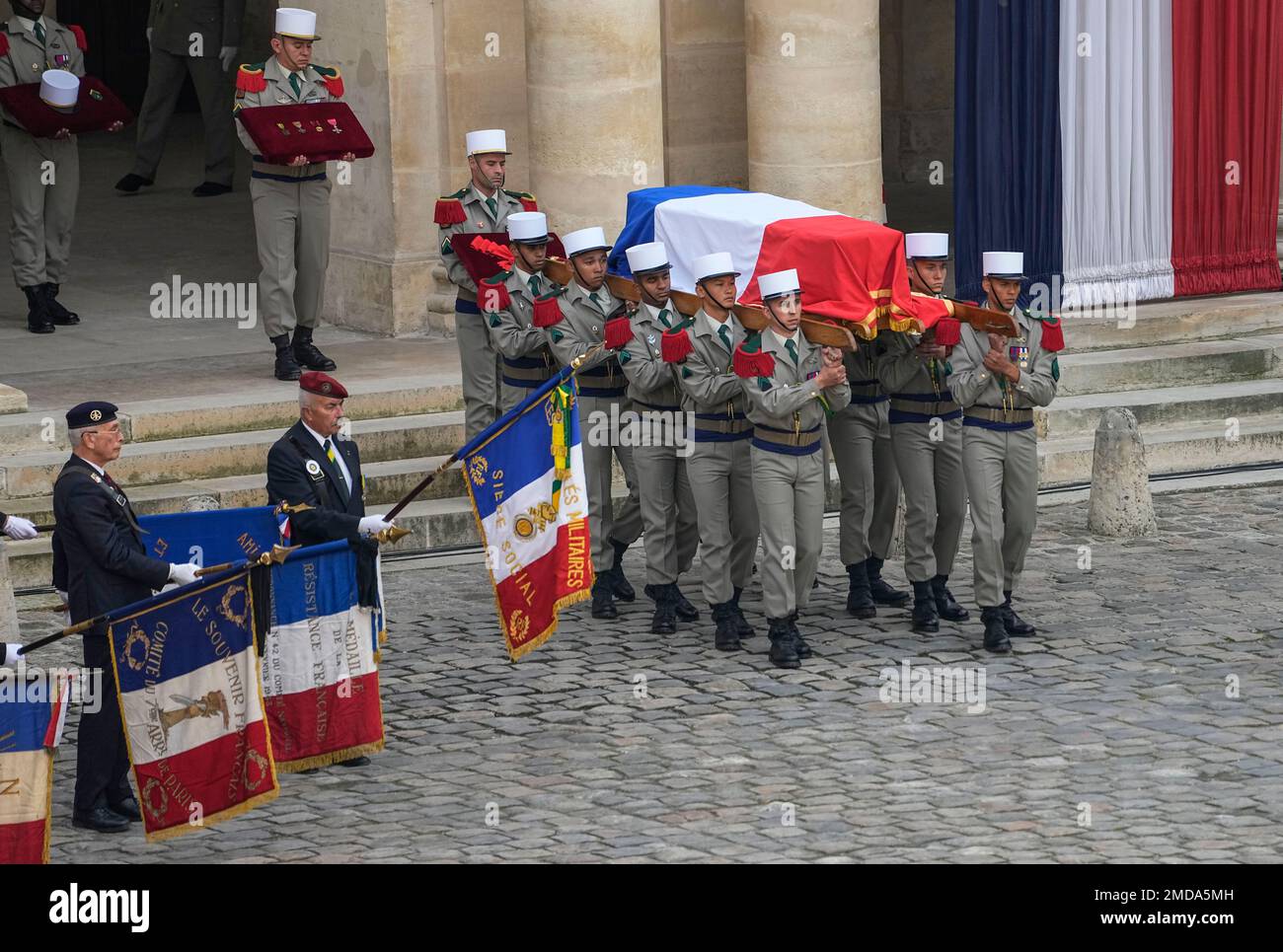 Soldiers of the foreign legion carry the coffin of late Hubert Germain ...