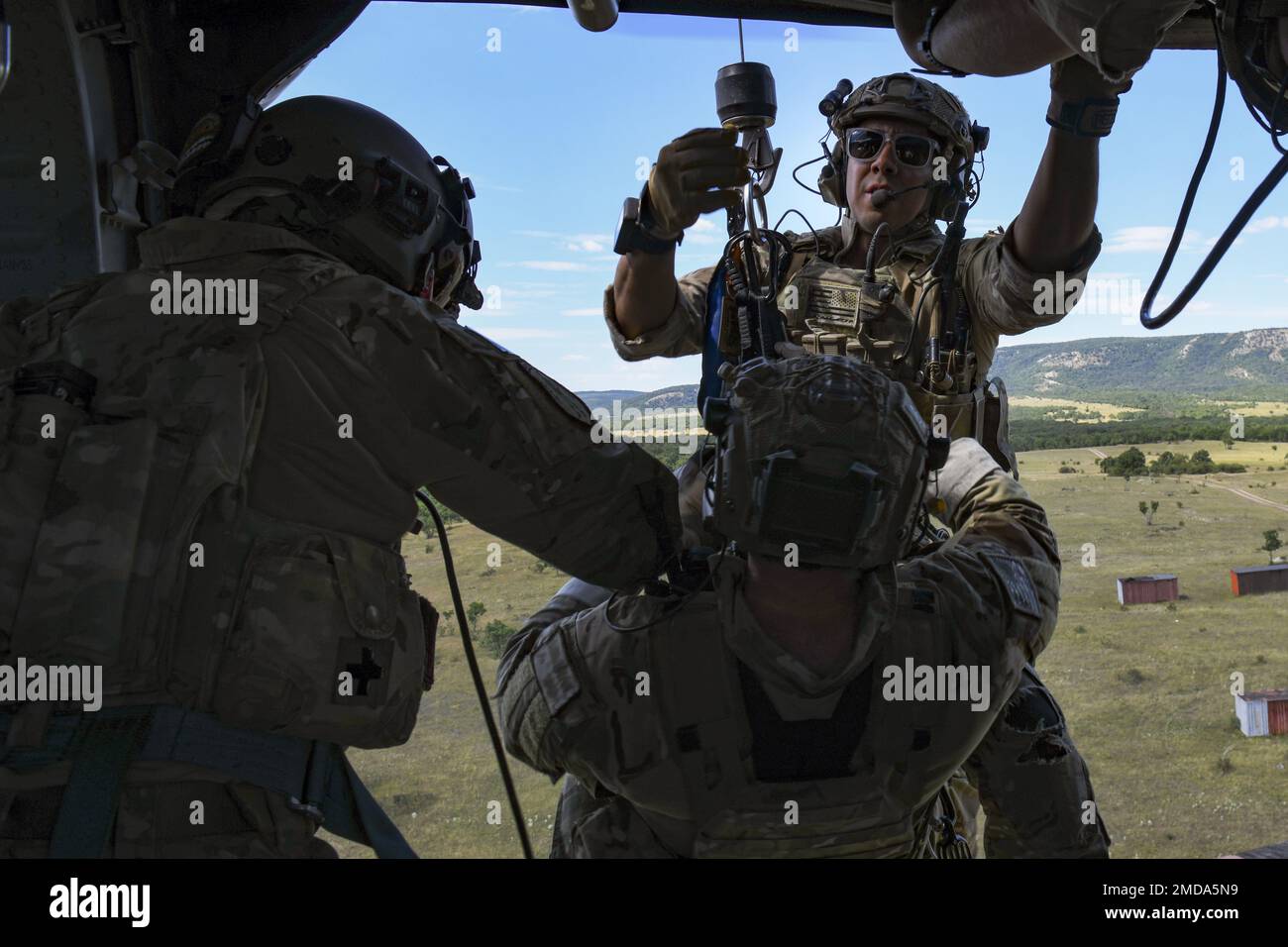 U.S. Air Force pararescuemen assigned to the 57th Rescue Squadron ...