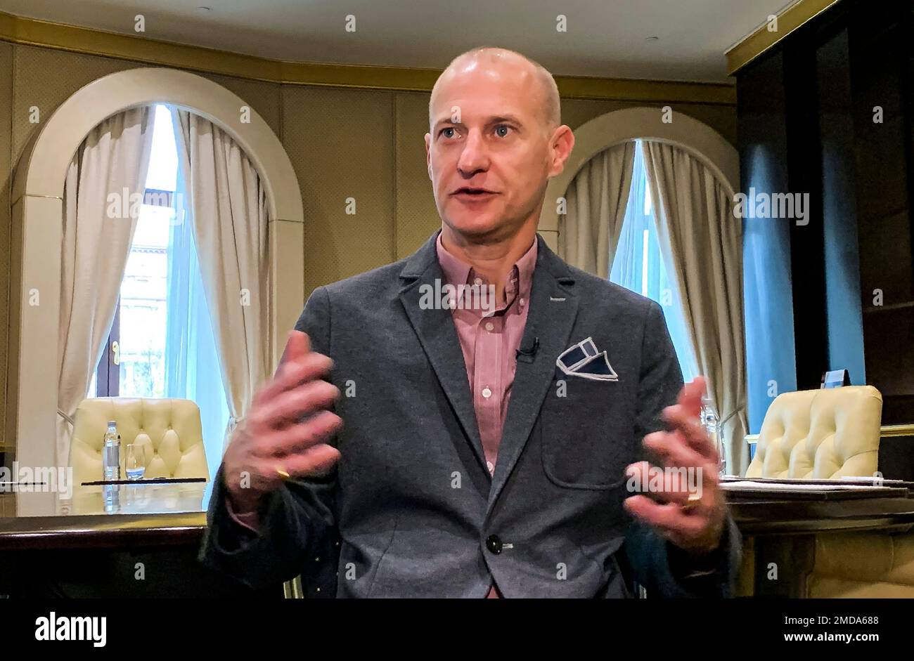 Tom Shelley, the president of Space Adventures gestures while speaking ...