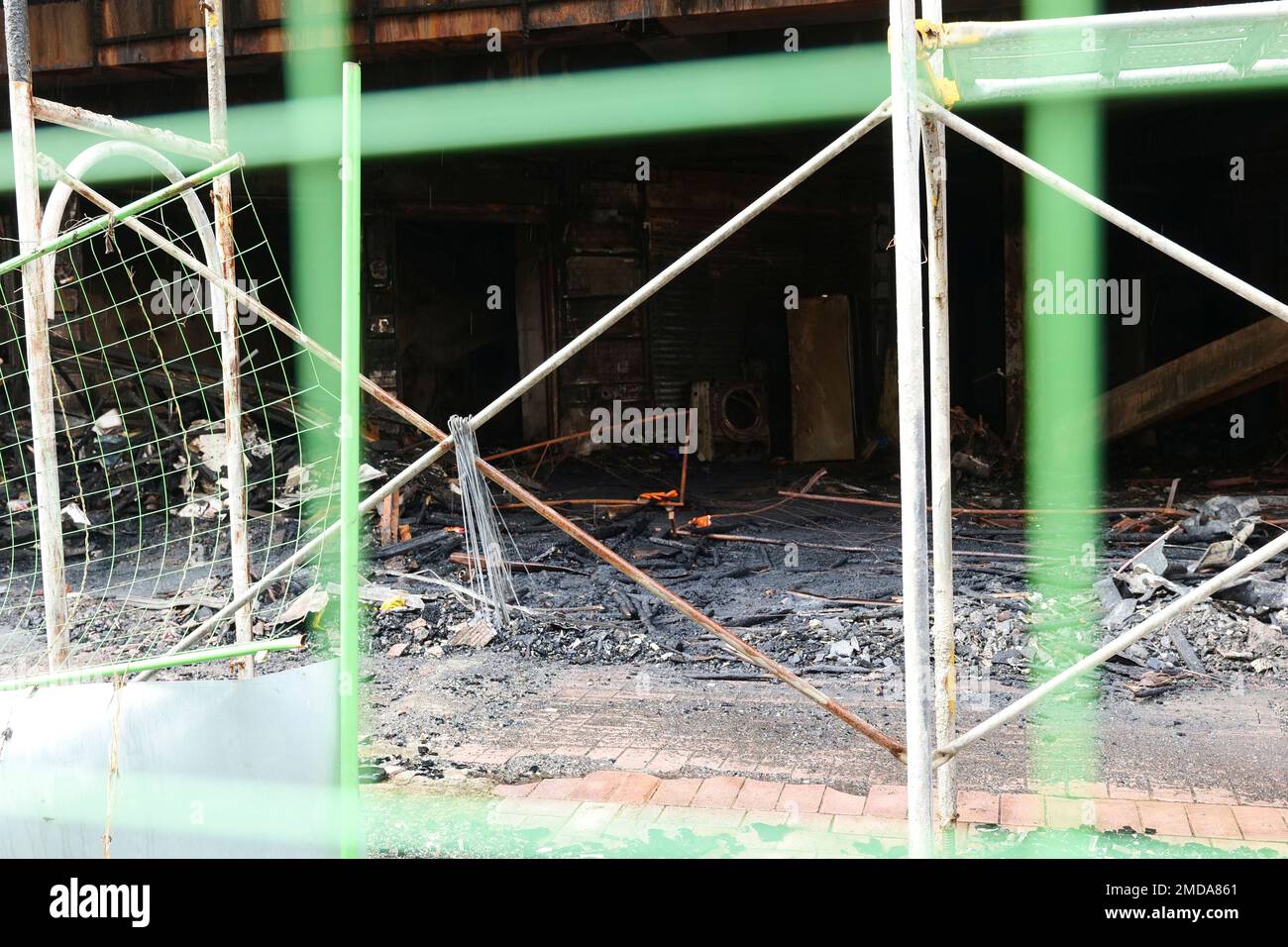 A burnt building is pictured in Kaohsiung in southern Taiwan on Friday ...
