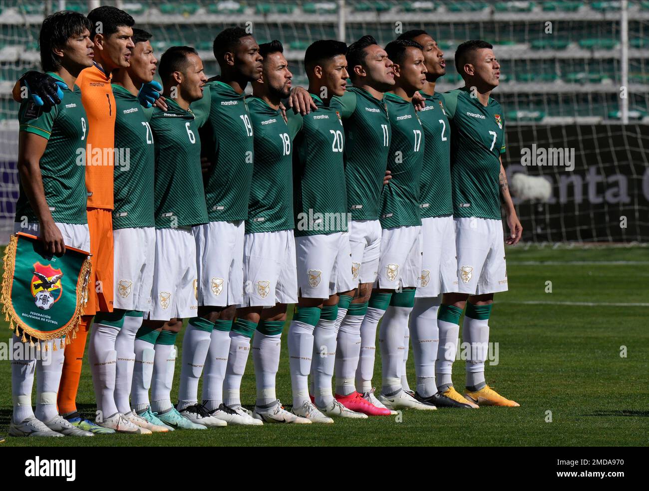 Bolivia's players sing their national anthem prior a qualifying soccer ...